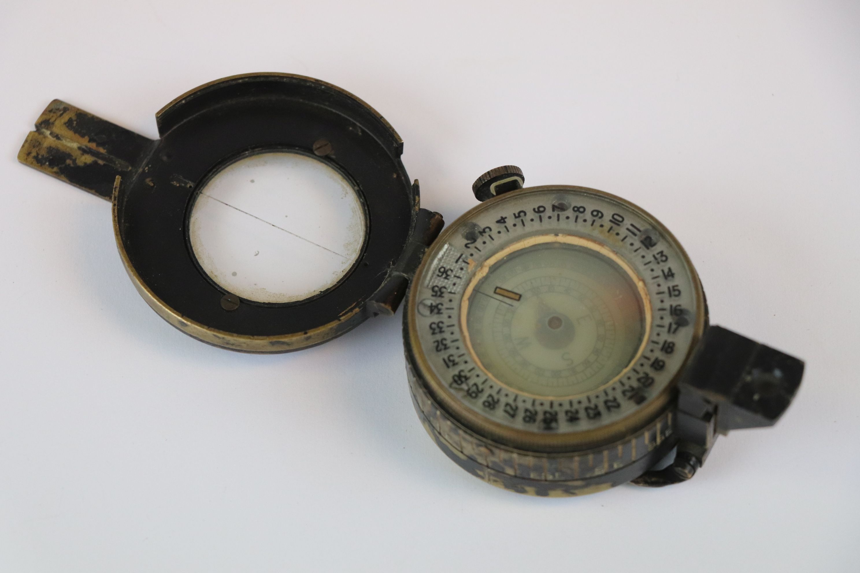 A British WW2 Marching Compass By T.G.Co Ltd London No.B149466 1942 MKIII.
