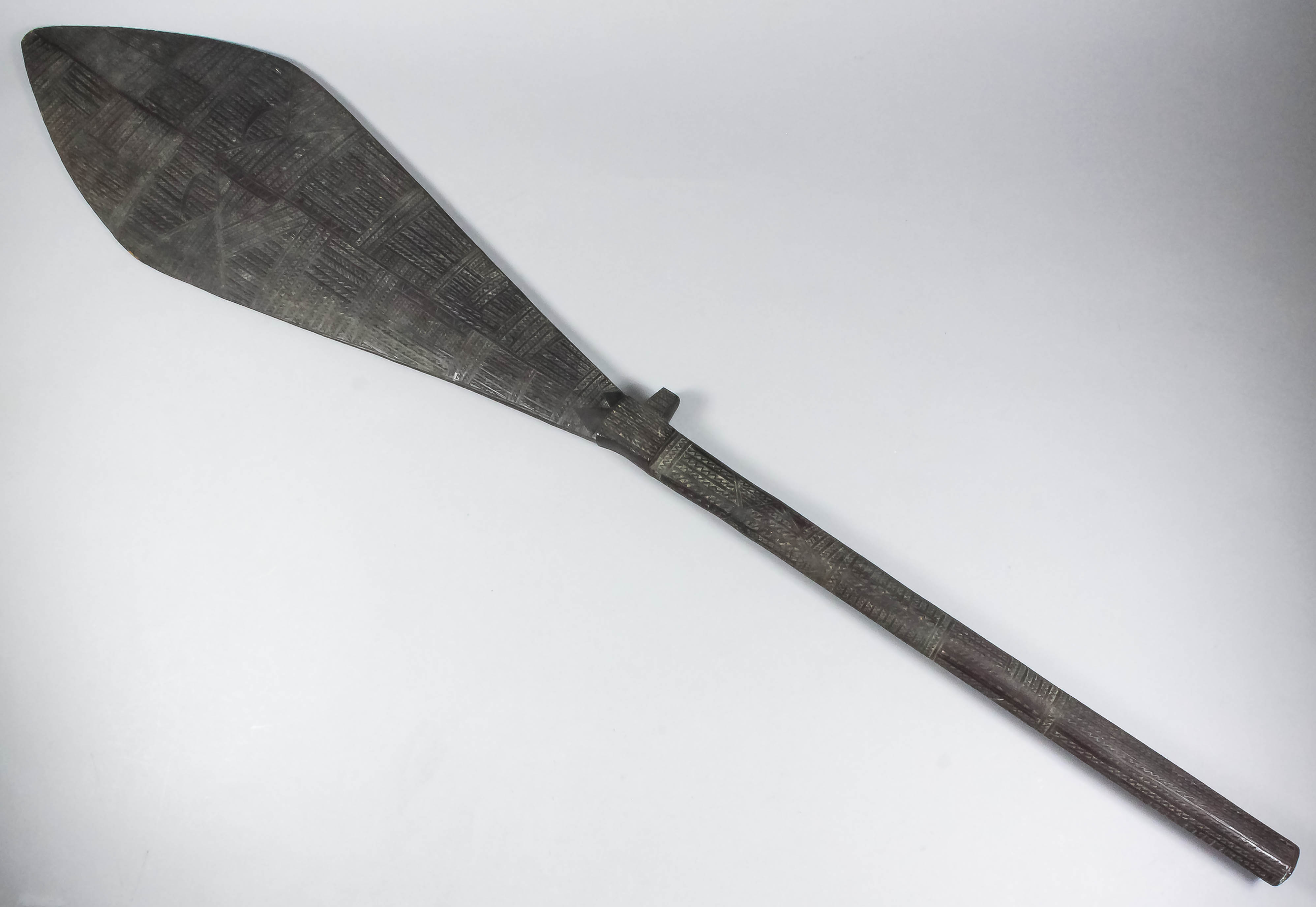 An ethnic carved ceremonial paddle, 44ins (reduced in length)