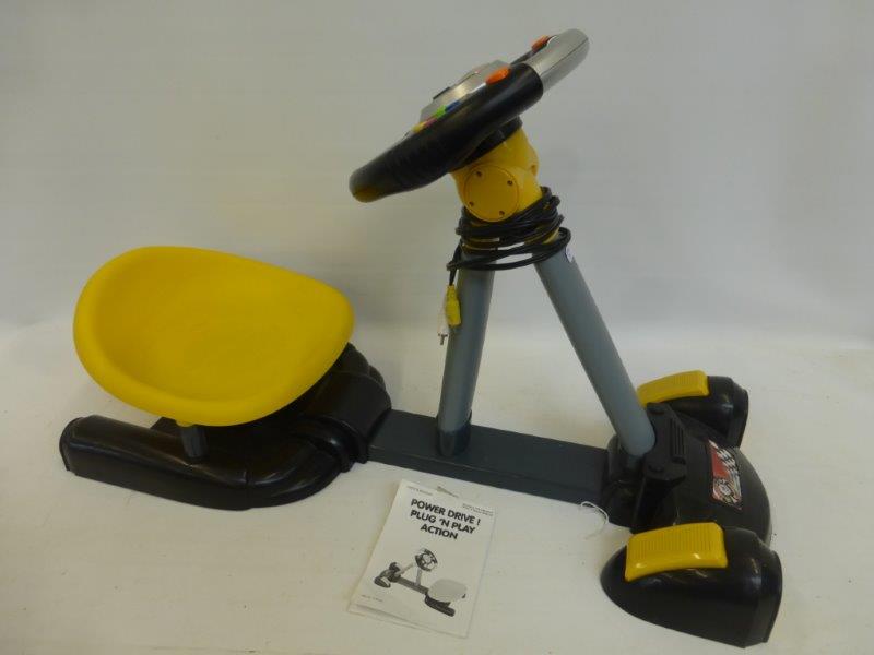 A Power Drive Plug 'N' Play action racing cart.