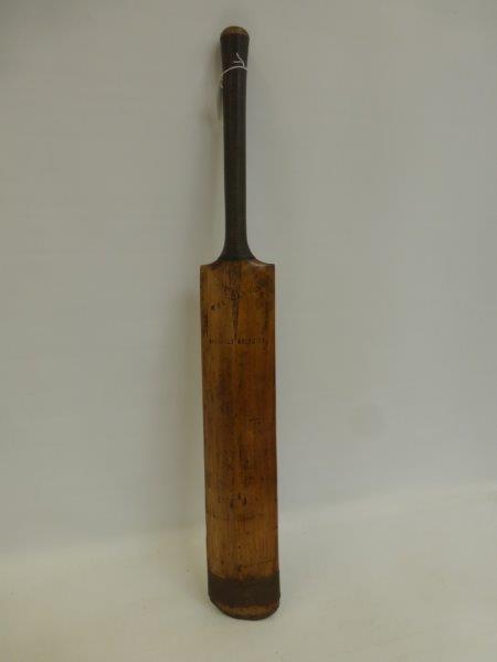 A 1920s Gunn & Moore "The CANNON" treble spring cricket bat.