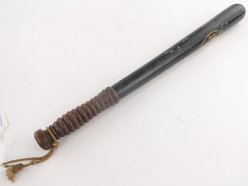 A Victorian truncheon with ring turn handle and painted and gilded ...