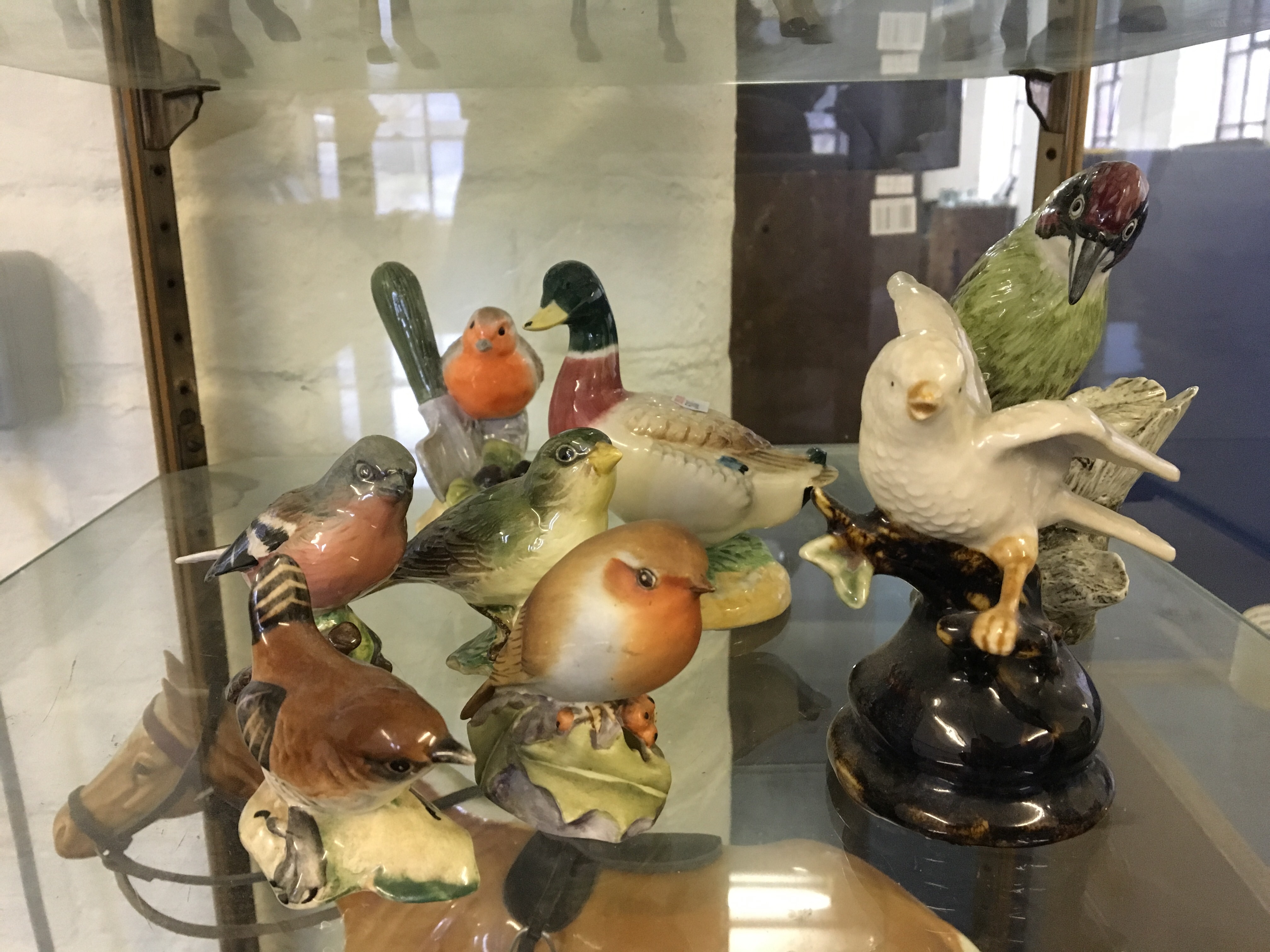 Three Beswick birds, wren, chaffinch, greenfinch, two birds marked on ...