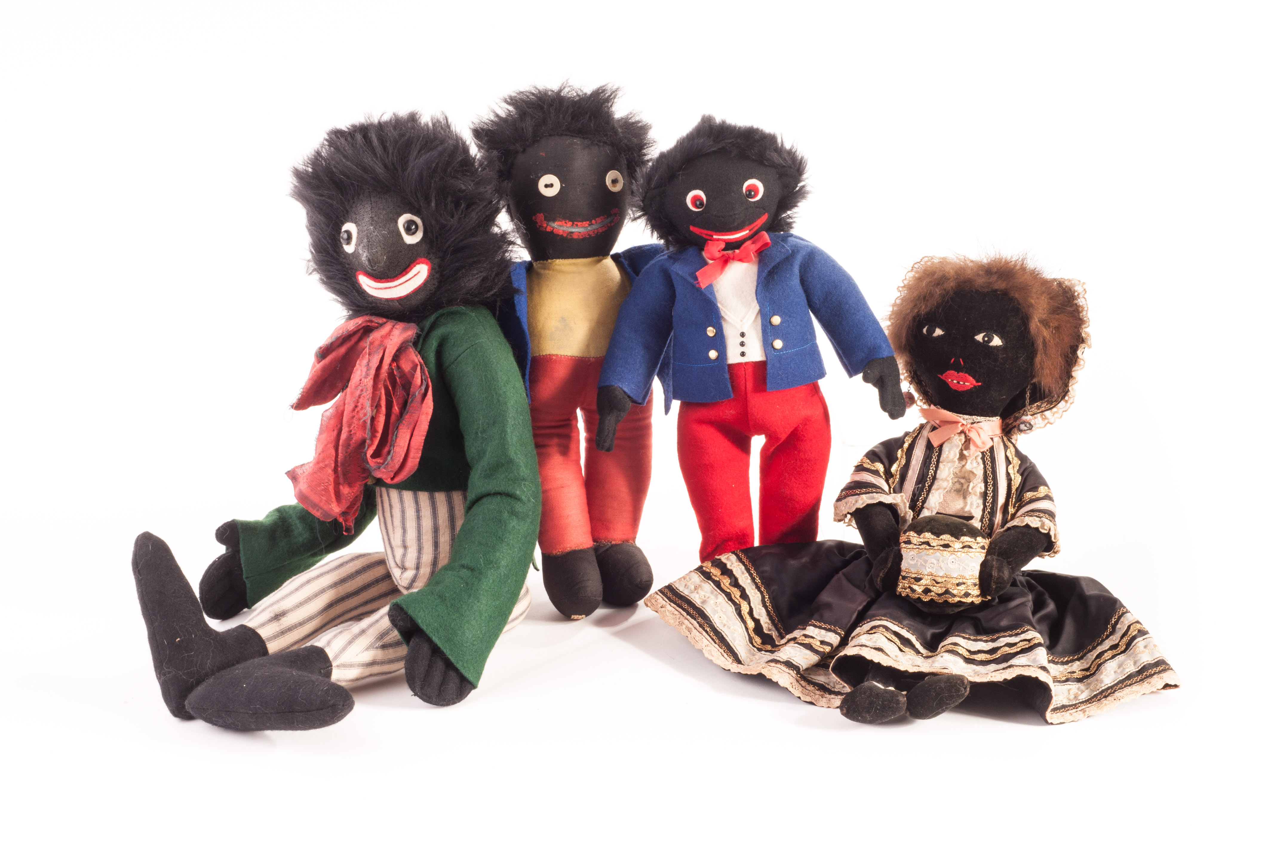 A Chad Valley Golliwog, 1930s, of black, yellow and red cloth, mohair ...
