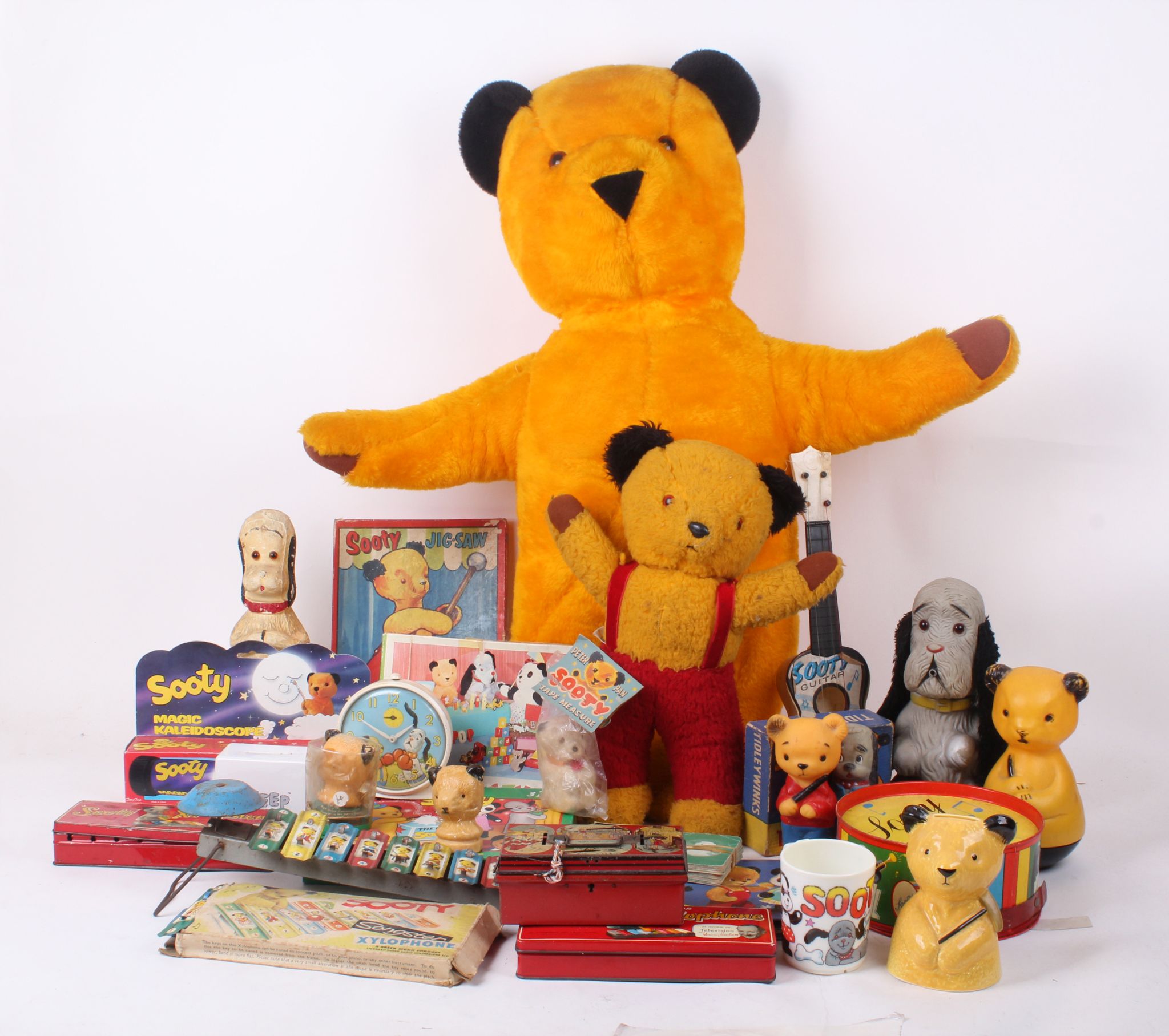 A collection of vintage Sooty toys and ephemera, including a large ...