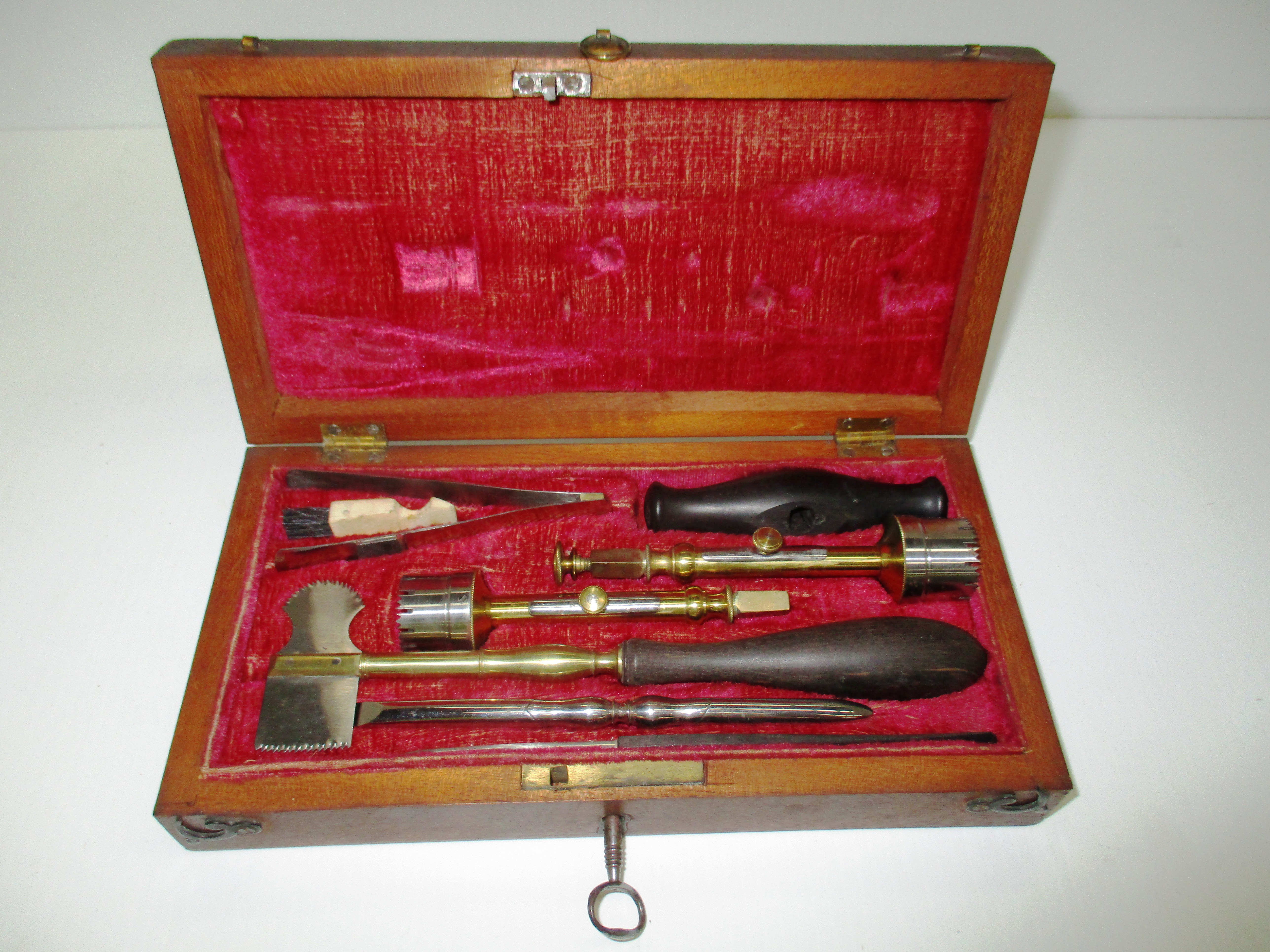 Surgeons trepanning medical tool kit with brass and metal instruments ...