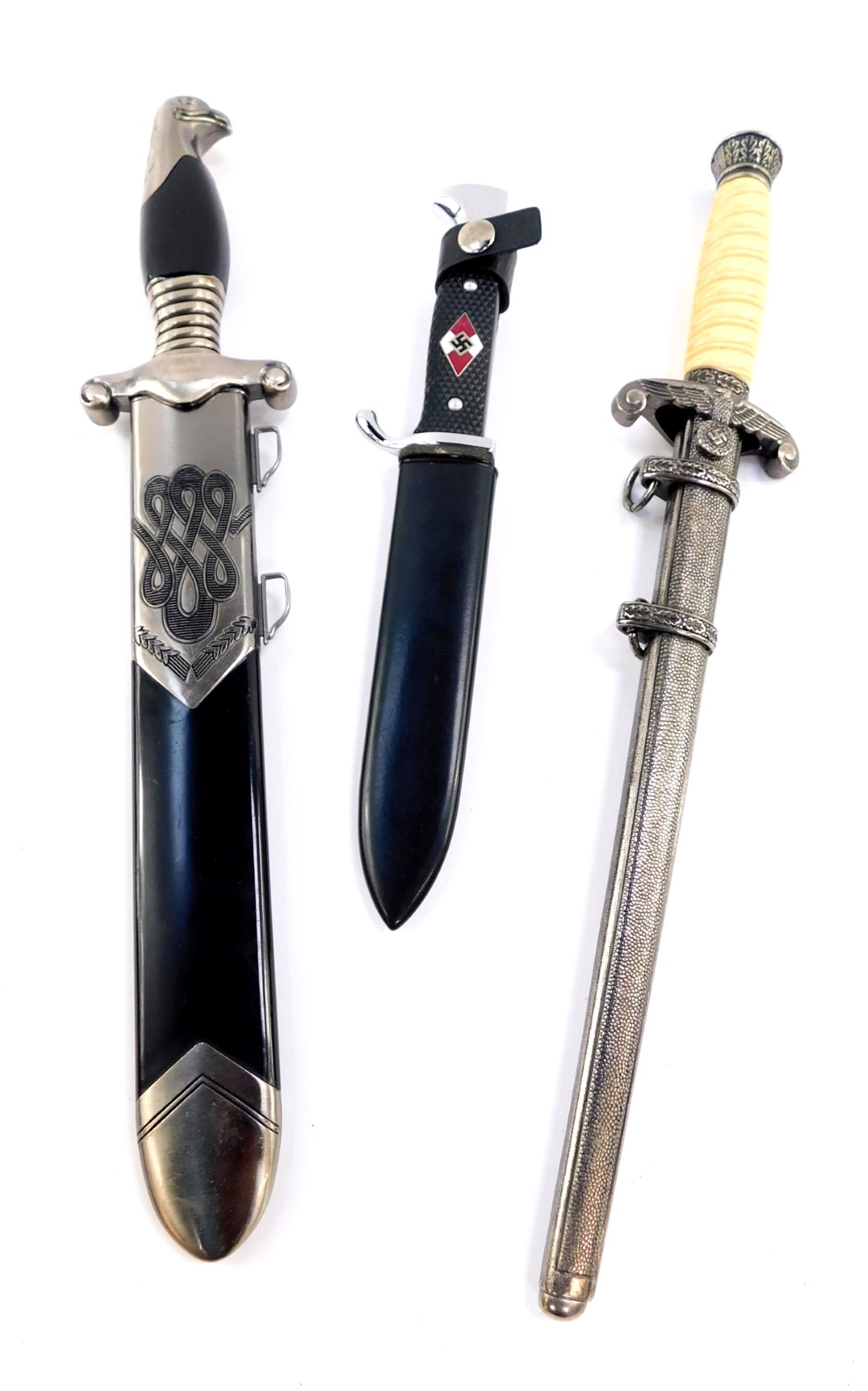 Three Third Reich replica daggers, comprising an RAD ...