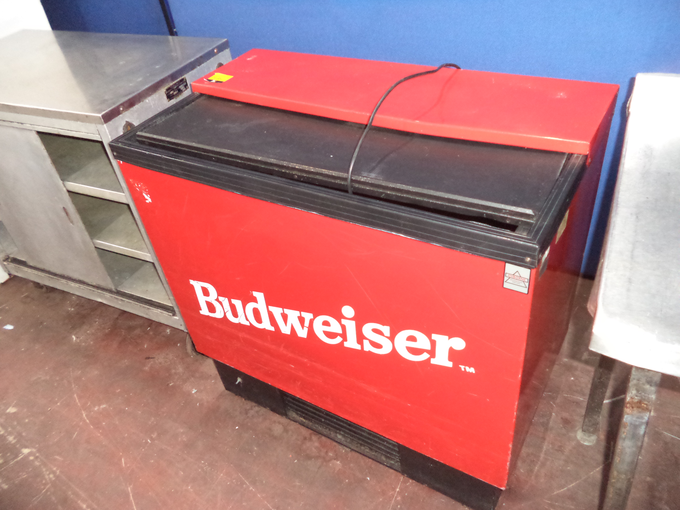 Budweiser bottle/bar fridge with sliding top access IMPORTANT: Please ...