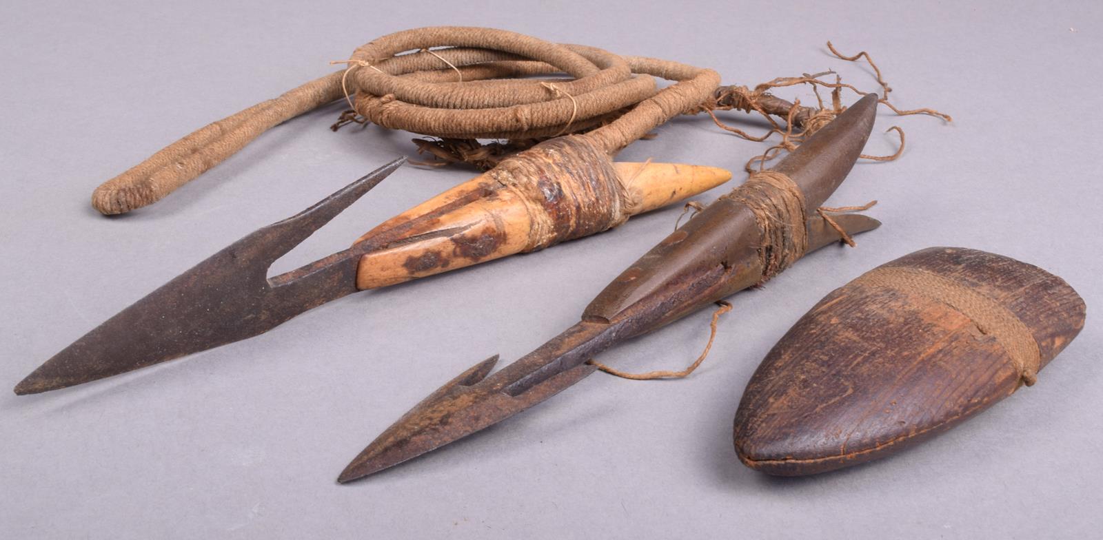 A Northwest Coast harpoon point, bone and iron with rivets and fibre ...