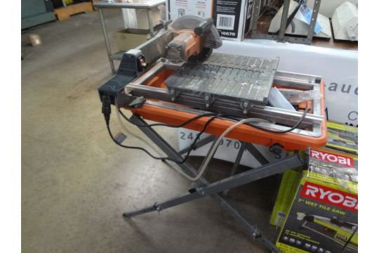 7" RIDGID MODEL R4030 WET TILE SAW WITH STAND