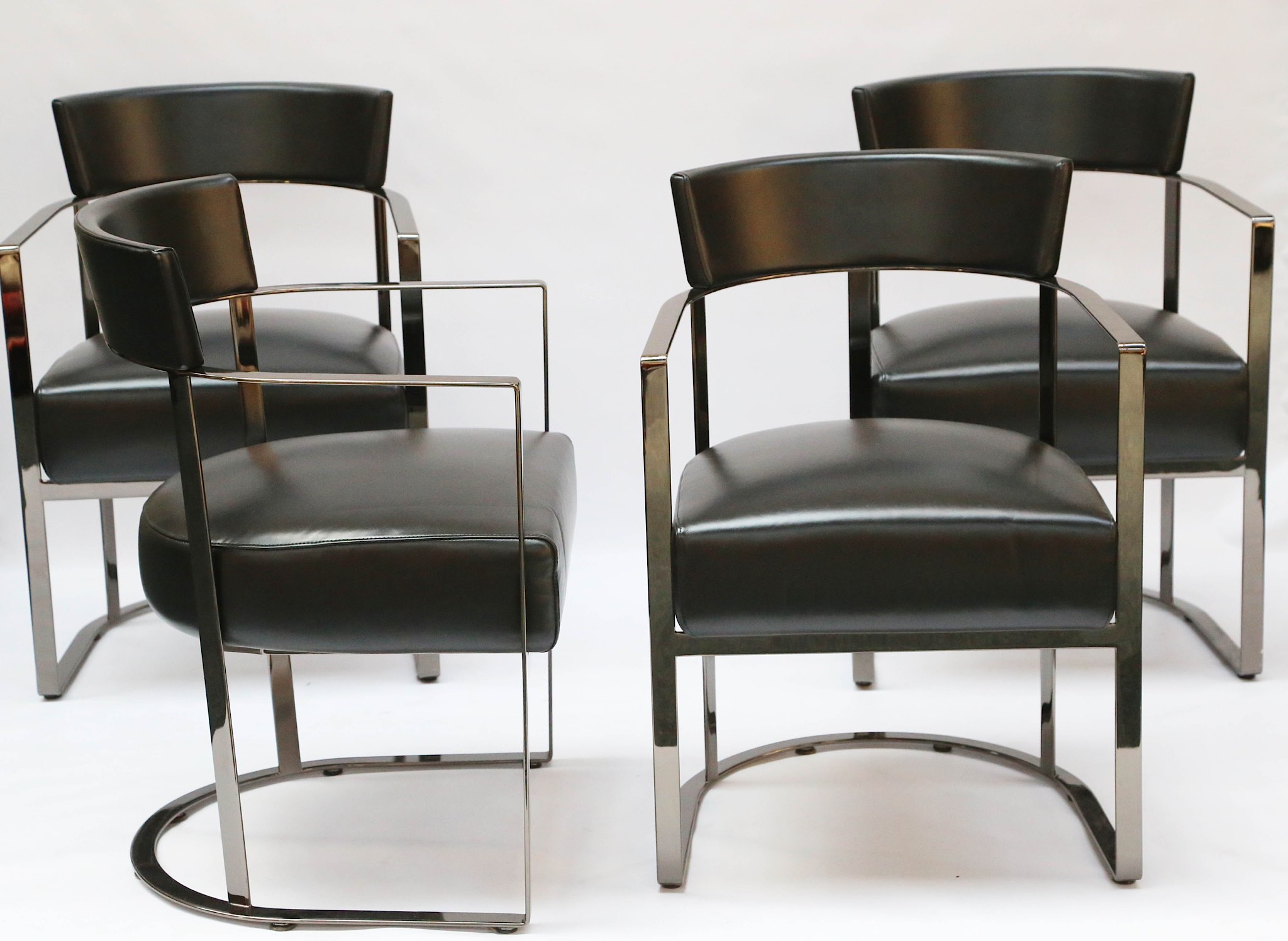 A set of four Morgan dining chairs, manufactured by Flexform Italy ...