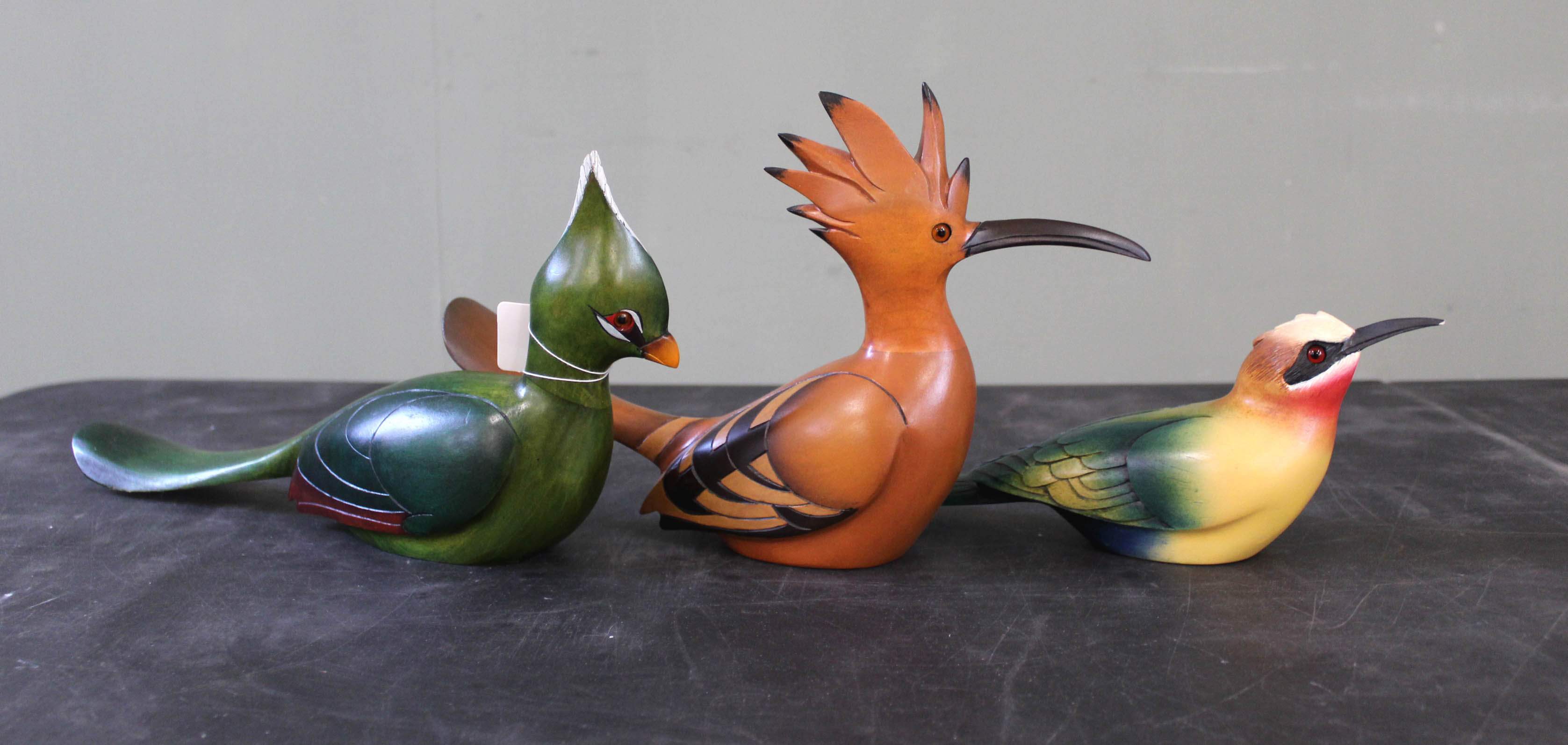 Three various hand carved and painted limited edition Feathers Gallery ...