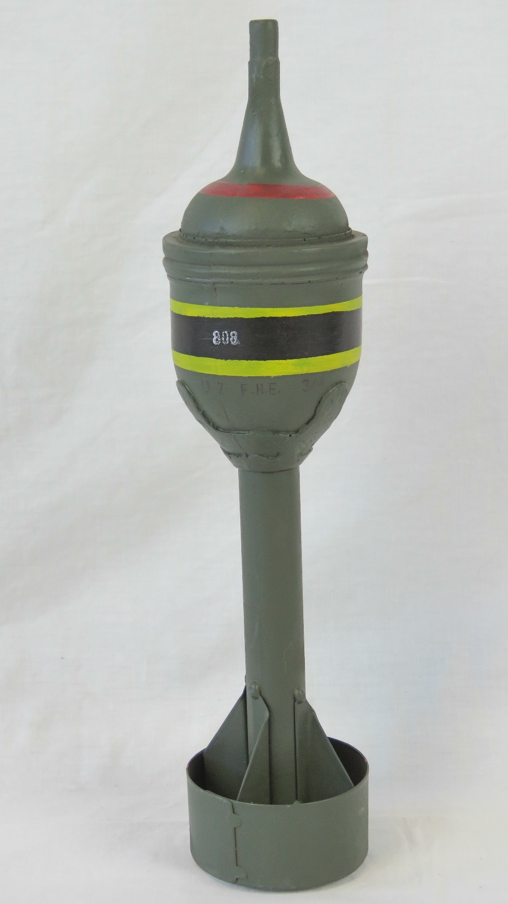 An inert WWII British PIAT Anti-Tank round, high explosive version with ...