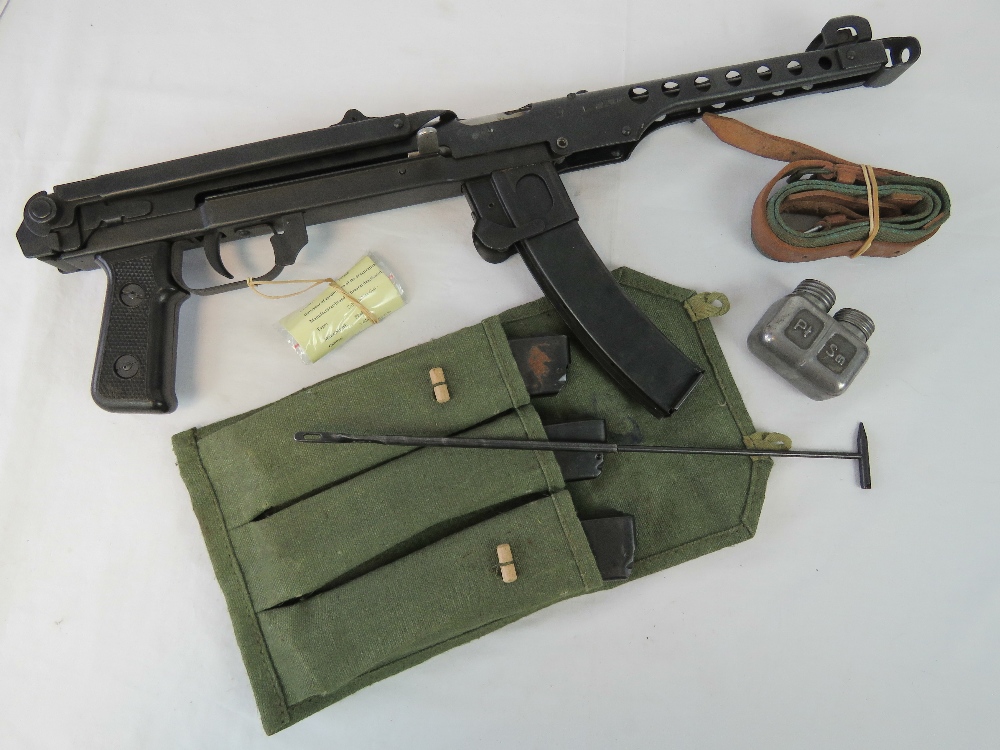 A deactivated Soviet PPS-43 SMG with accessories kit including spare ...