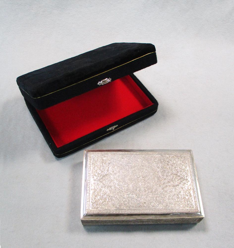 A 20th century Iranian box, of rectangular form, heavily decorated all ...