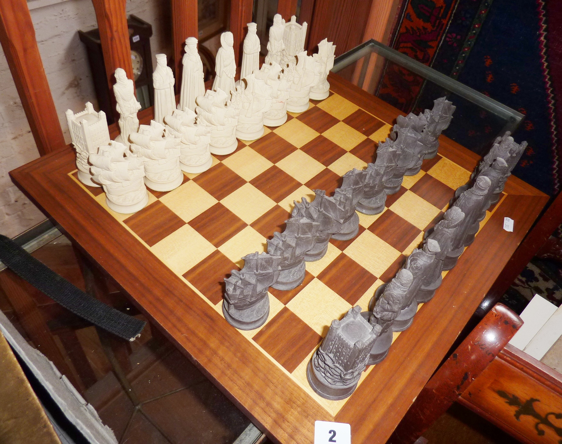 Nautical-themed chess set on wooden board