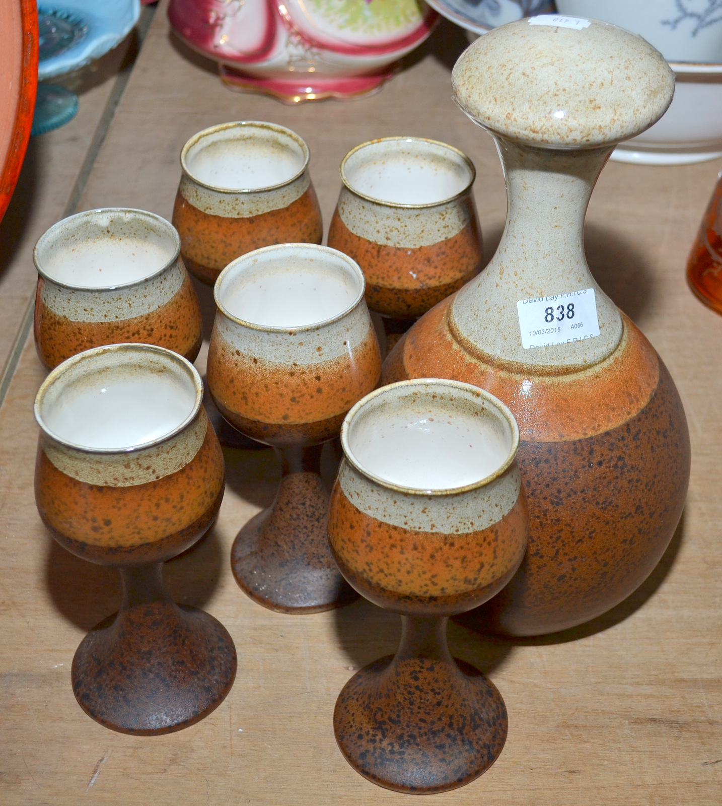 A Iden Pottery, Rye, Sussex wine flask and six matching goblets, the ...