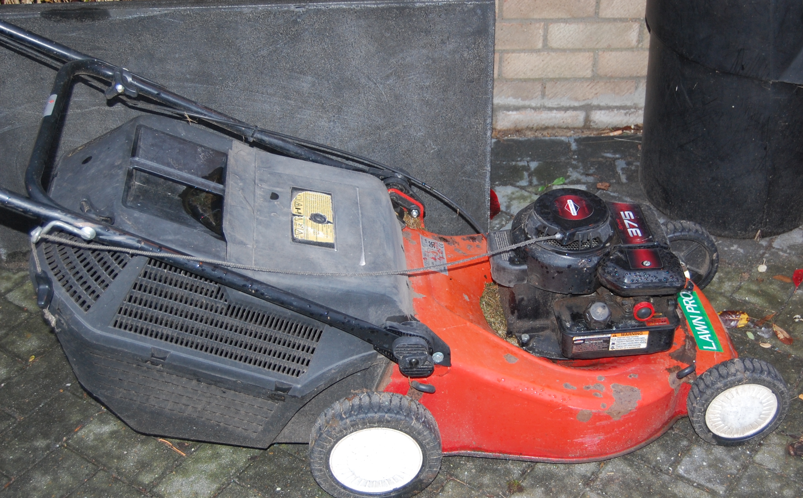 A Briggs & Stratton Lawn-Pro Sprint 375 petrol driven lawn mower with ...