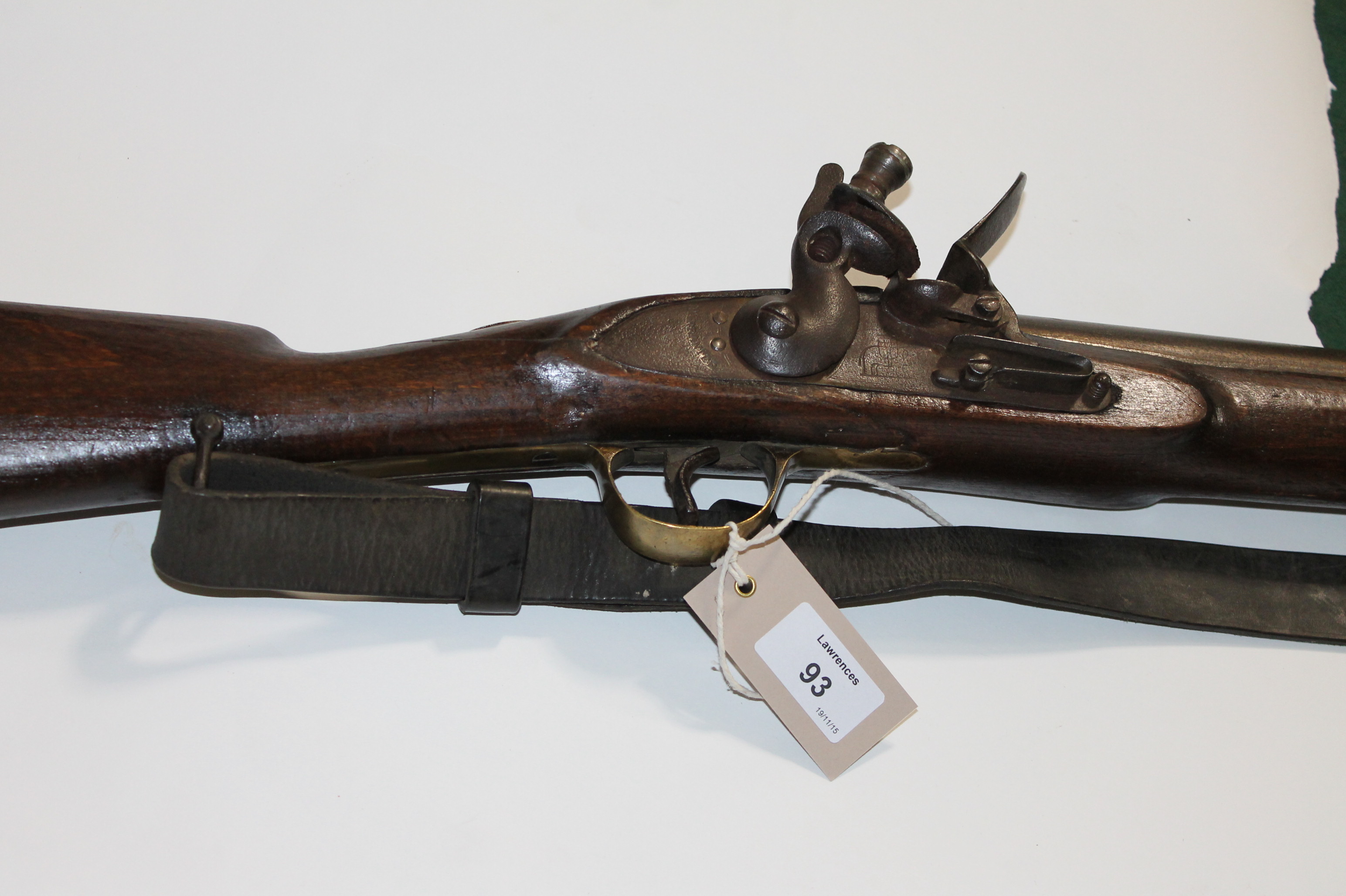 A BROWN BESS. A trade quality flintlock musket with EIC mark to the ...