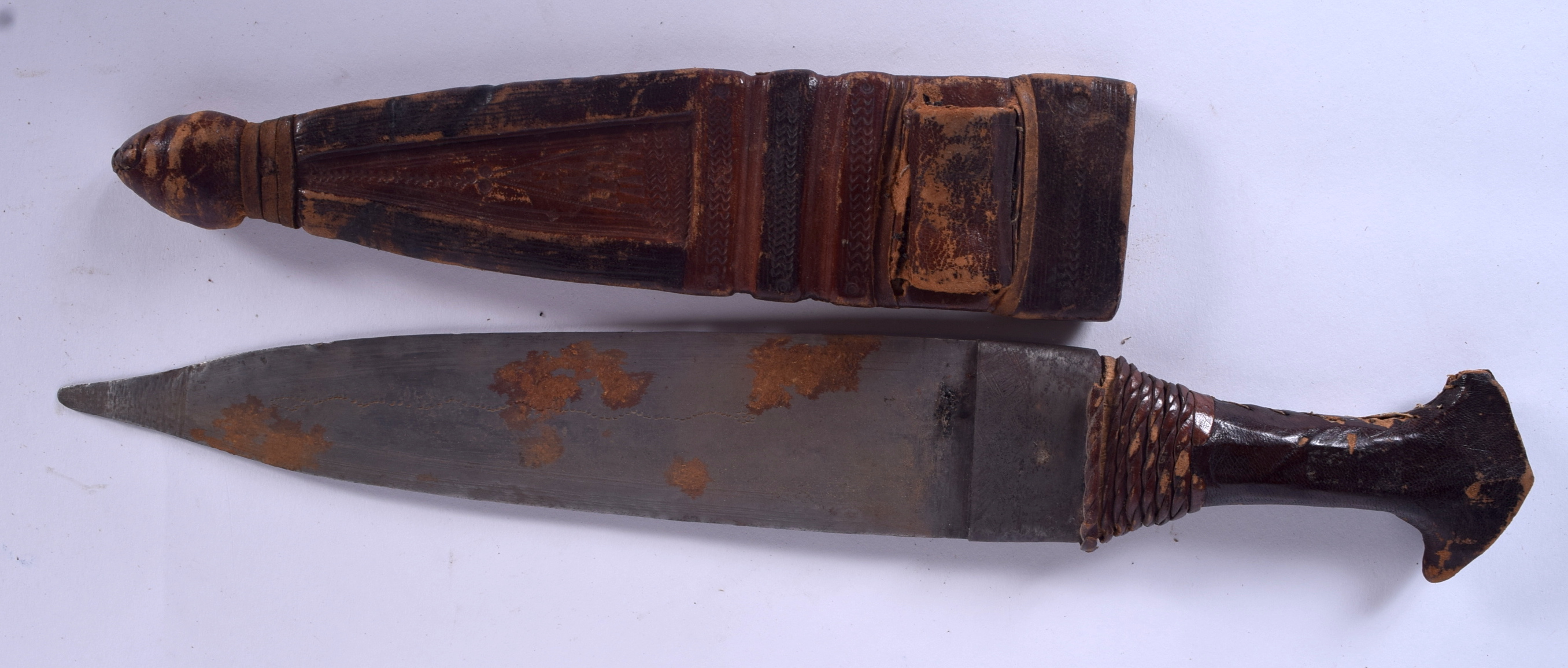 AN EARLY 20TH CENTURY AFRICAN TRIBAL CEREMONIAL DAGGER, formed with a ...