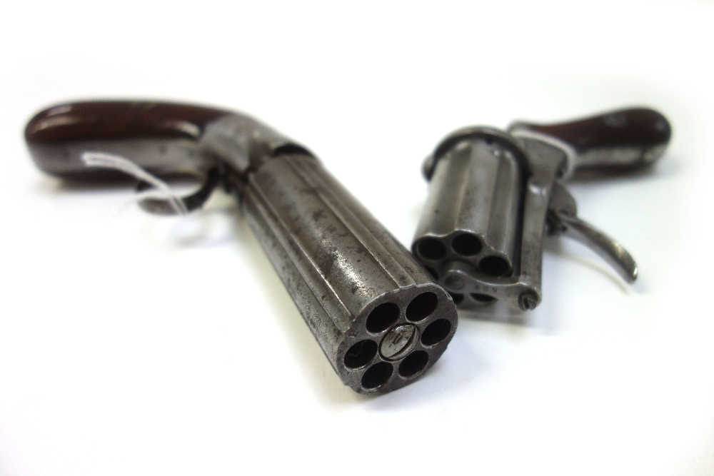 An early 19th century six shot pepper pot revolver, with steel ...