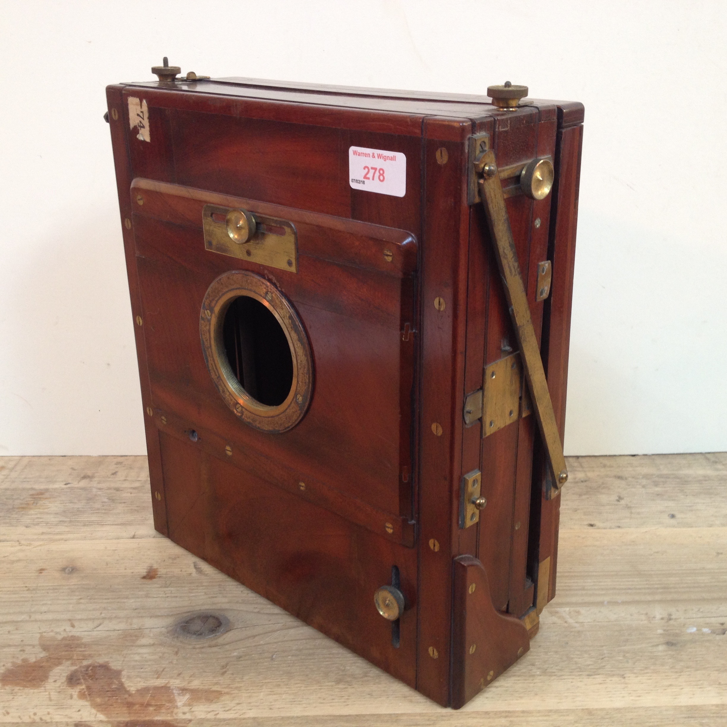 A large 19th Century mahogany and brass mounted plate camera with ...