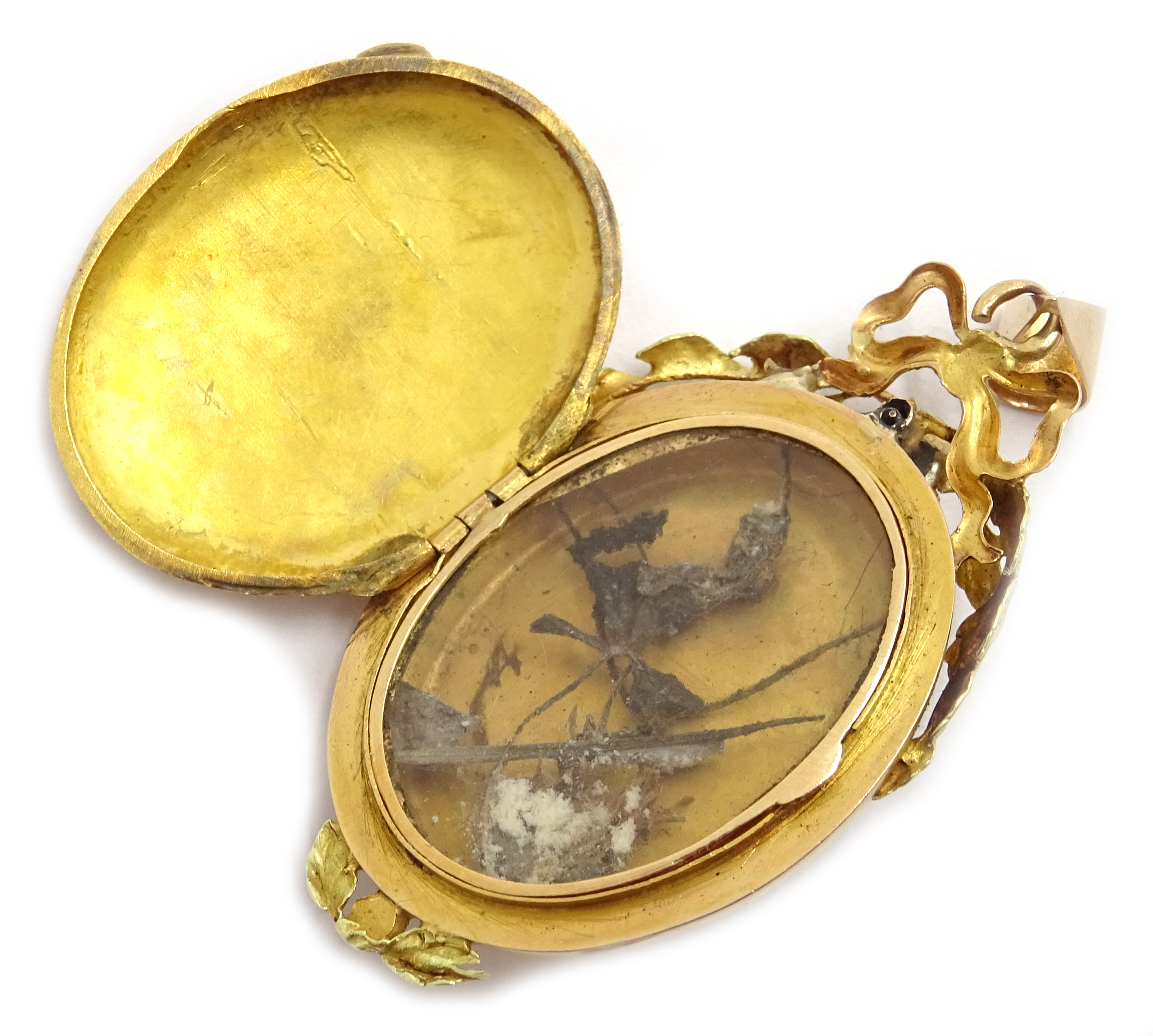 Victorian 18ct gold (tested) hinge back locket, with floral motif set ...