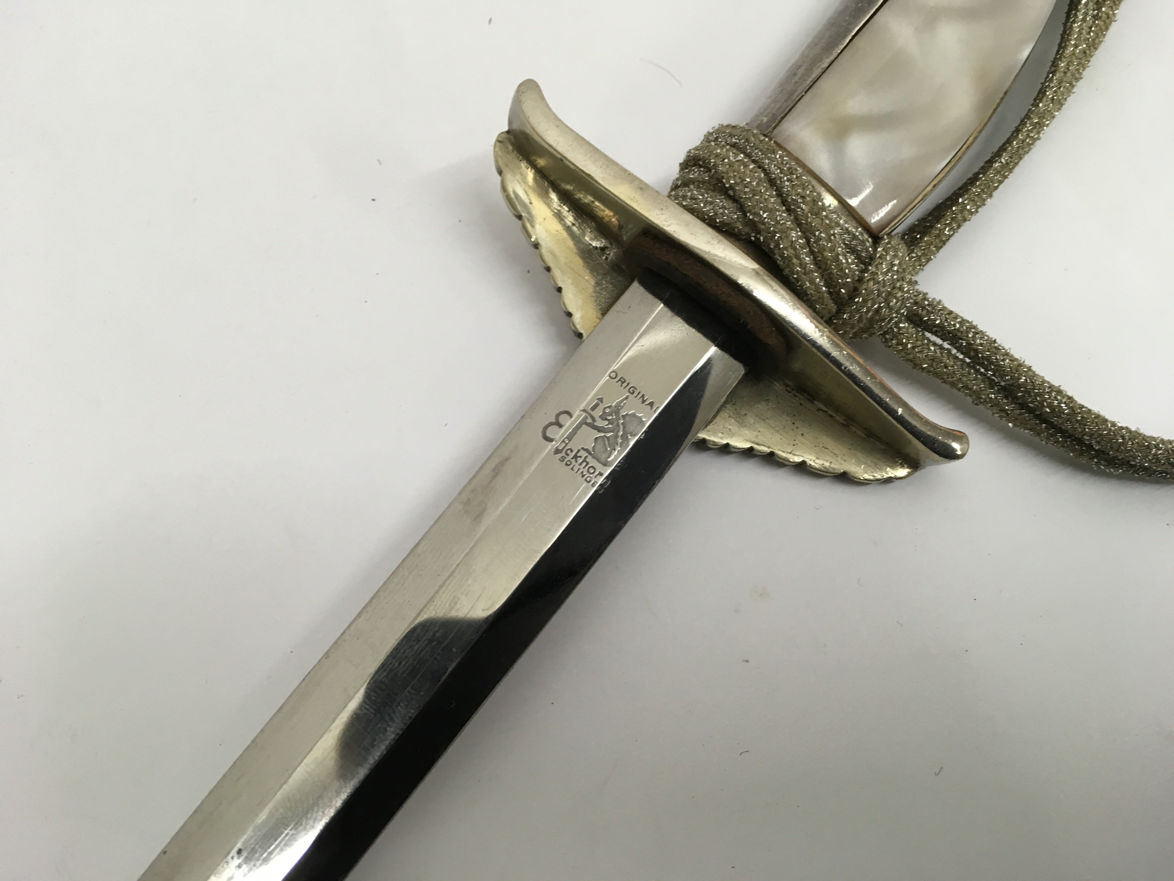 A German Diplomat’s dagger with pearl grips and Eickorn markings.