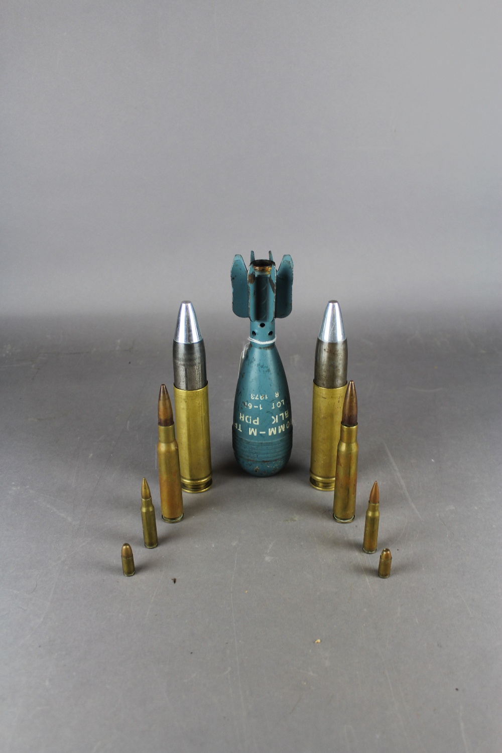 A Group of inert shells and mortar bomb including two 75rg Armour ...