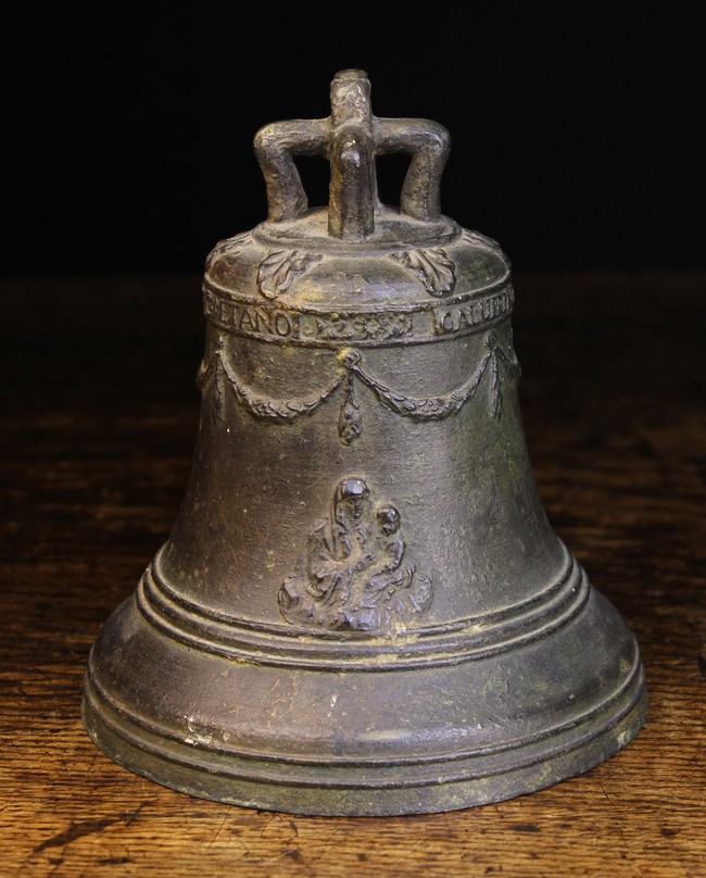A Bronze Bell Circa 1700, cast with a band of inscription round the top ...