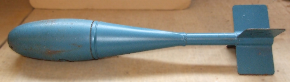 Two 25lb US practice bombs, Mk. 76, emitting smoke and/or flash on ...