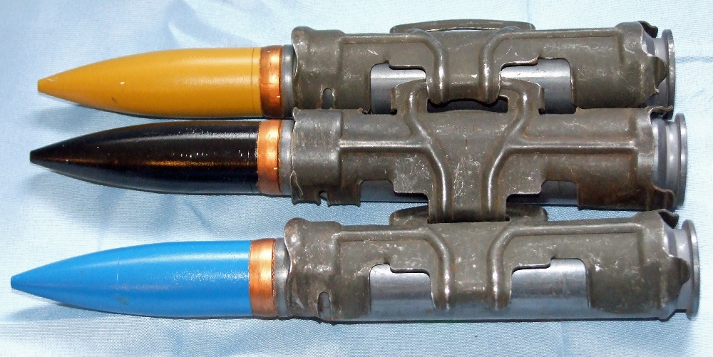 A mixed collection of ordnance to include three 27 mm rounds for use in ...