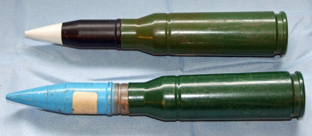 Two 25 x 137 mm rounds for the the Oerlikon KBA gun, green lacquered ...