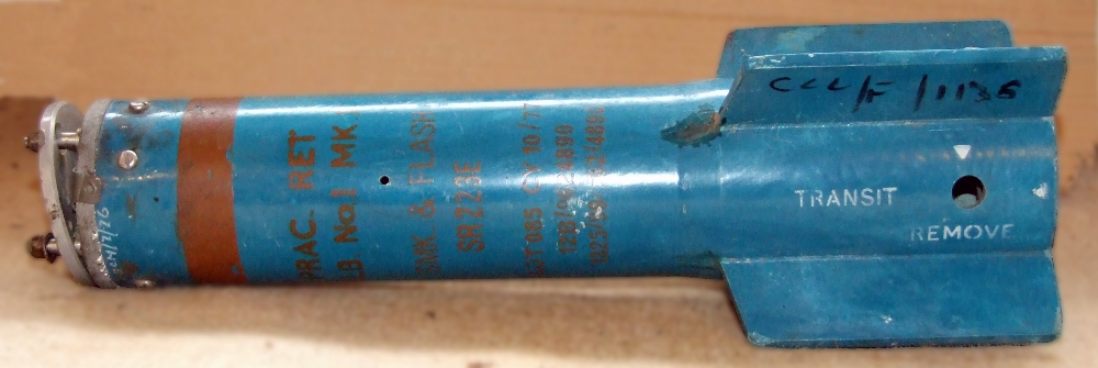 Two 25lb US practice bombs, Mk. 76, emitting smoke and/or flash on ...