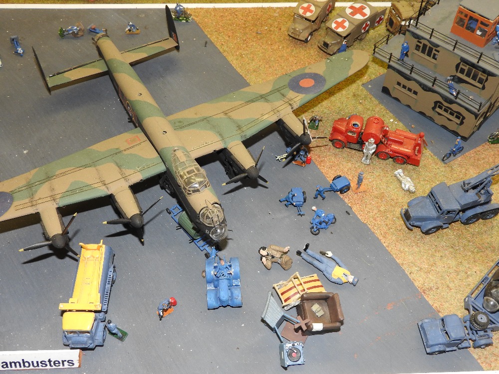 A small diorama titled Avro Lancaster 1/72 Dambusters, along with a ...