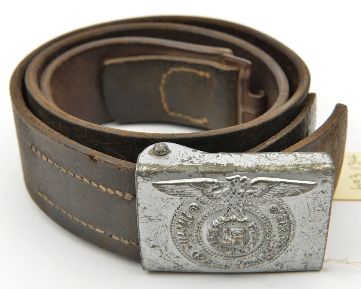 A Third Reich Waffen SS leather belt, with silver painted steel buckle ...