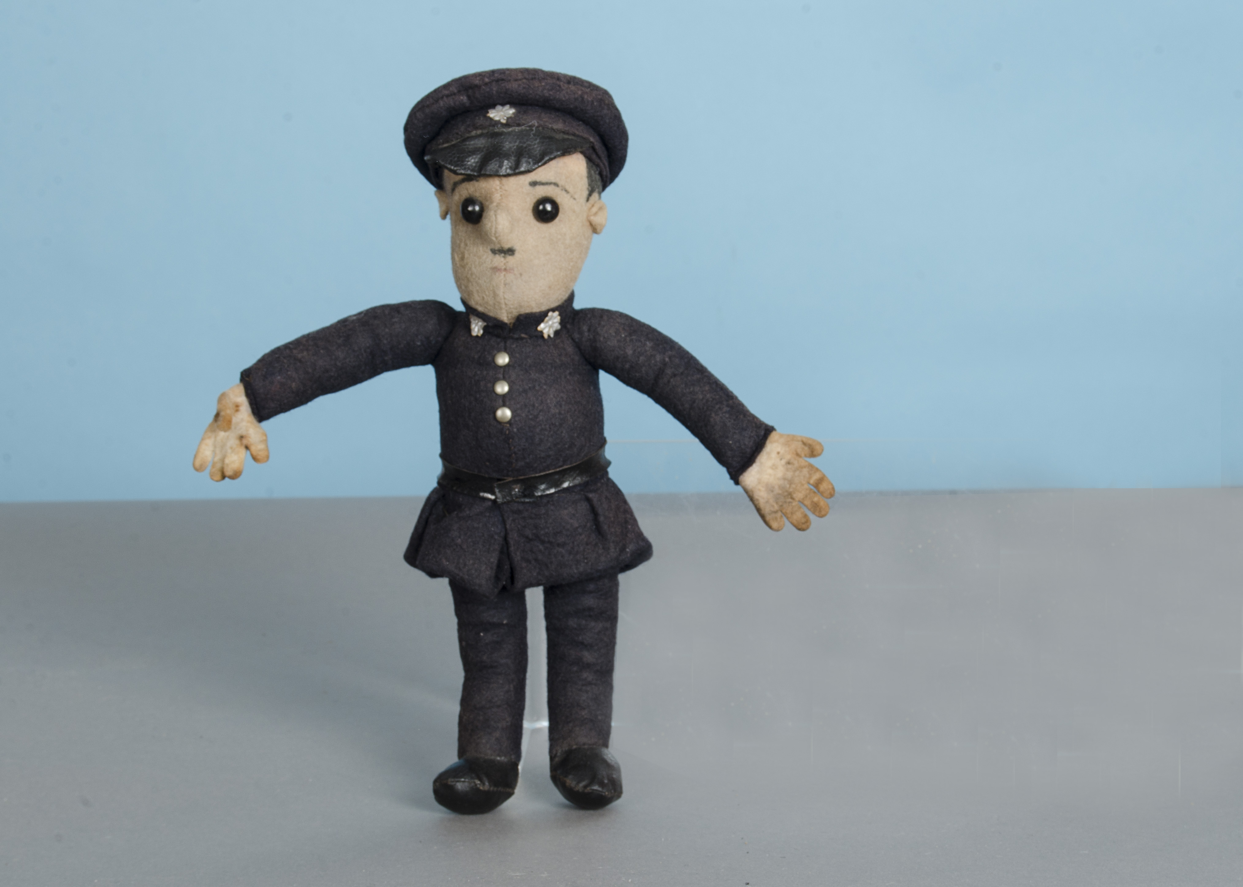 A rare felt American policeman doll, circa 1918, possibly Harwin, with ...