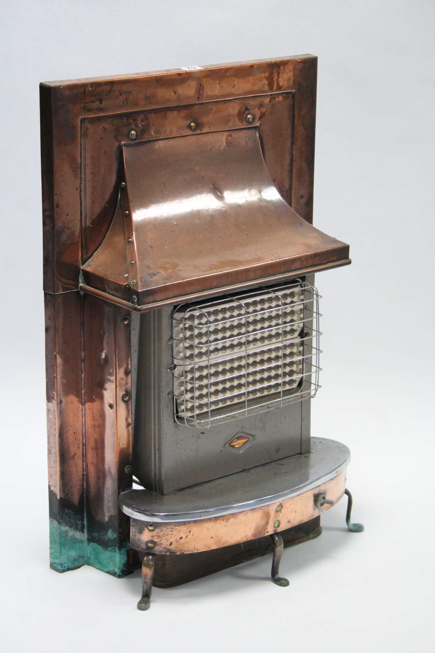 A Belling & Co. electric fire with copper surround, 19¾” wide x 29” high.