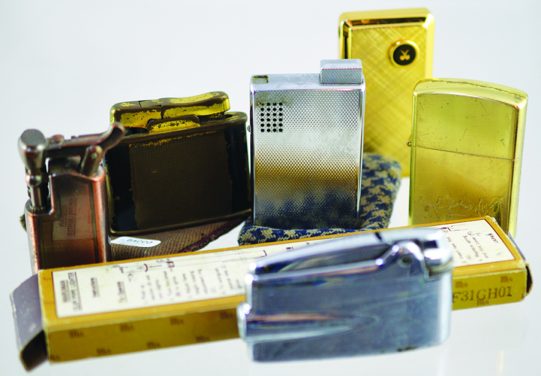 CIGARETTE LIGHTERS. Boxed Baroque pipe lighter, boxed Win International ...