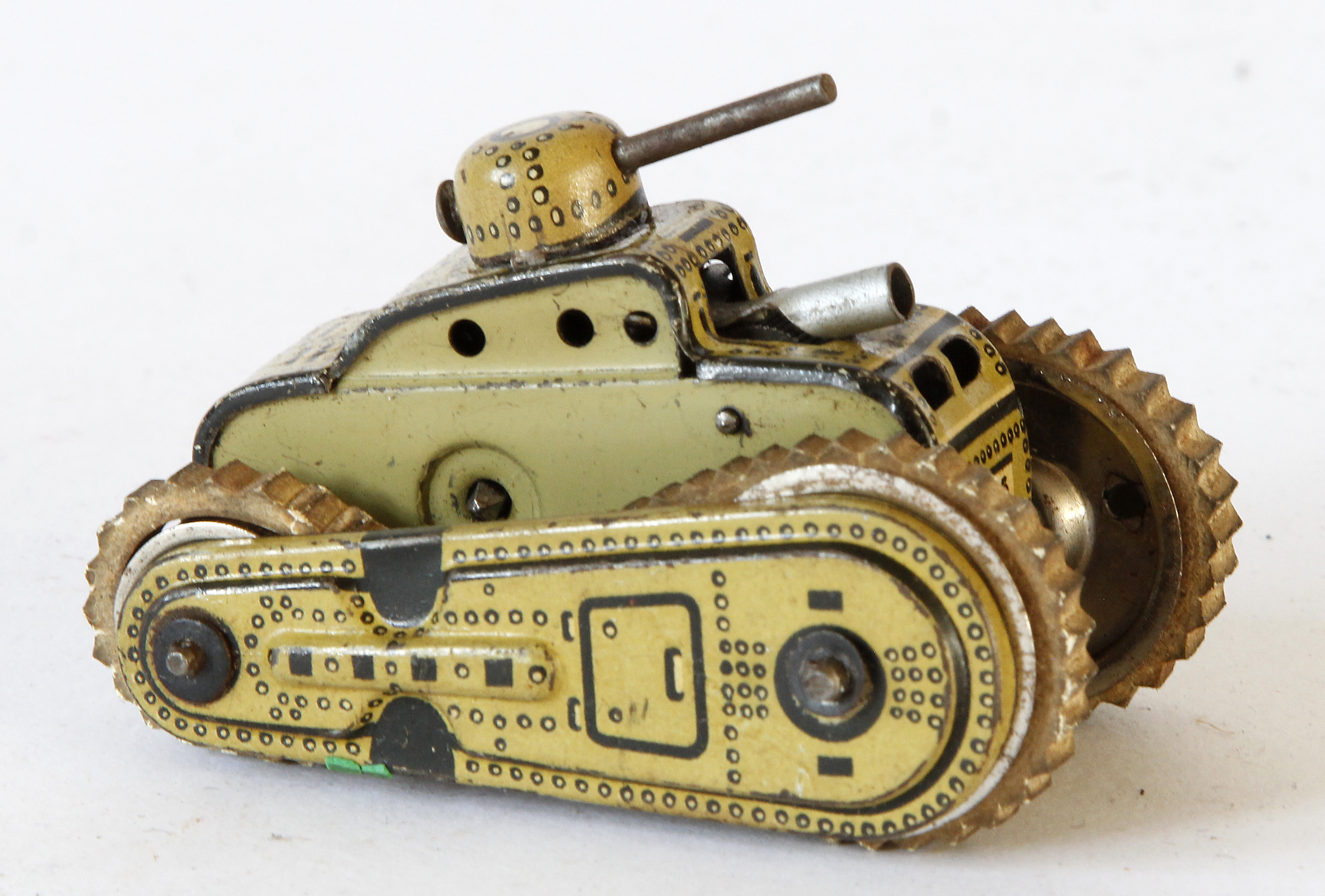 A small German tinplate clockwork tank by Gama With detailed tin ...