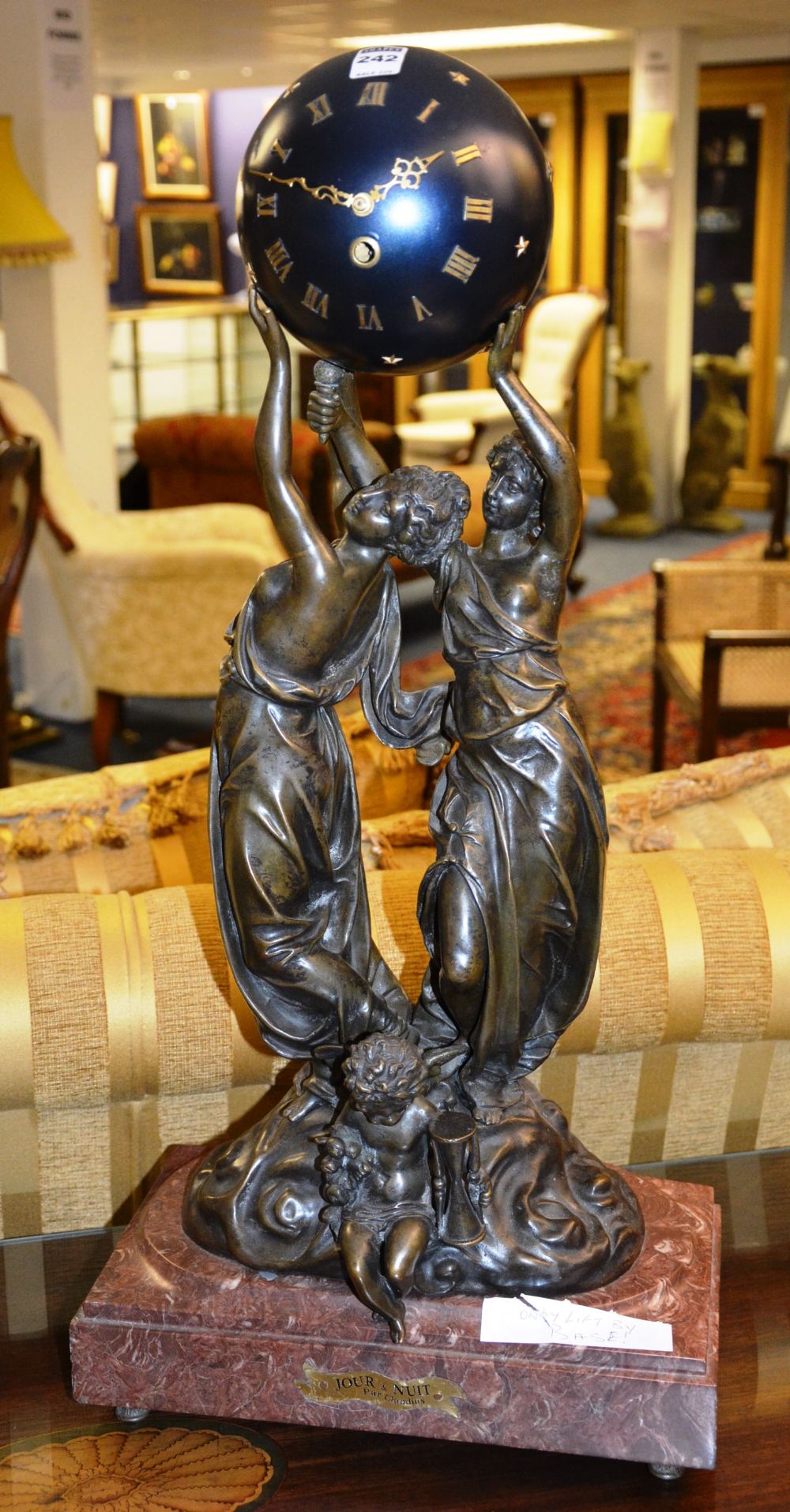 A fine bronze figural orb clock by August Moreau, jour & nuit par ...