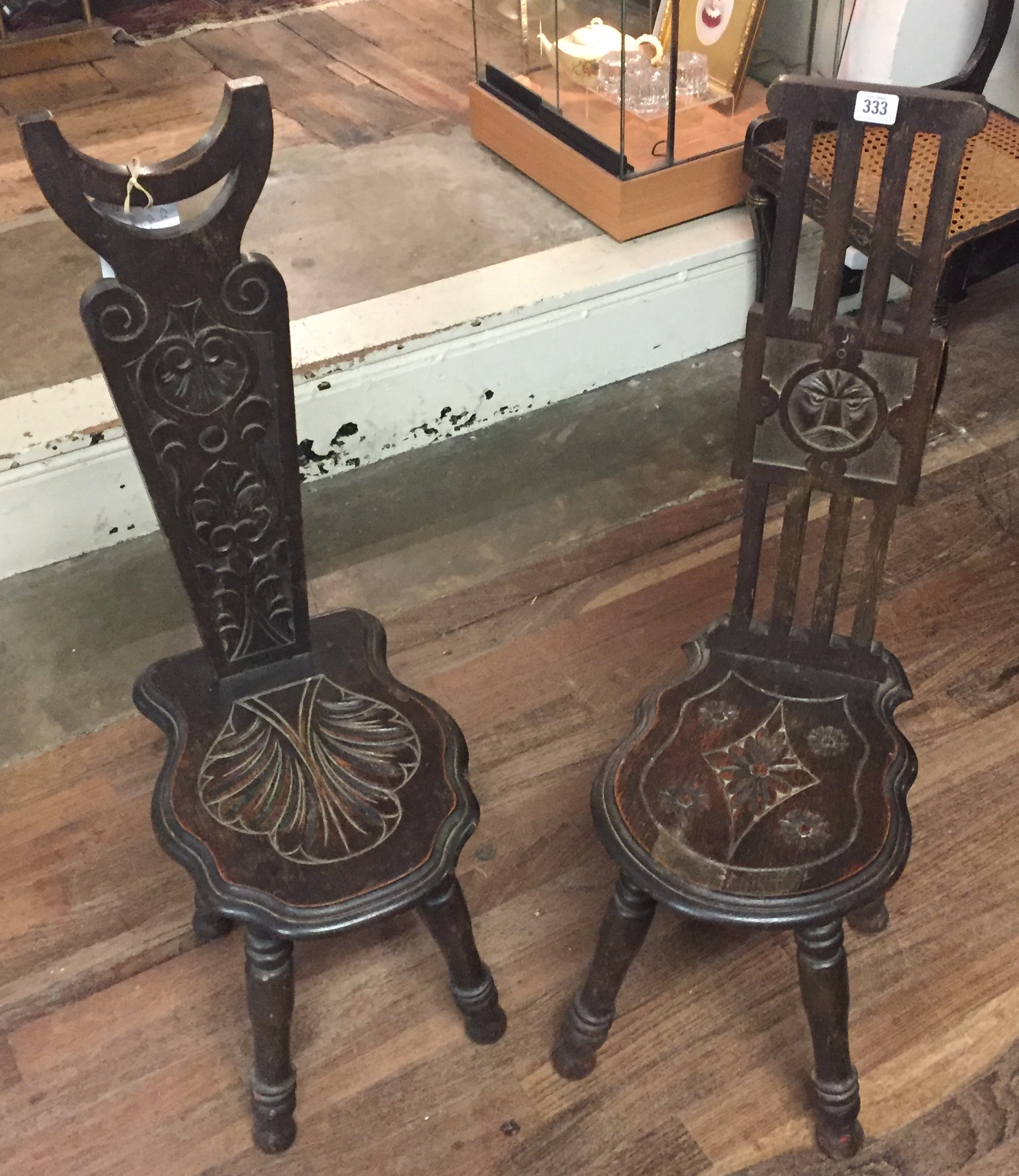 TWO ANTIQUE OAK WELSH SPINNING CHAIRS With carved decoration. (92cm x ...
