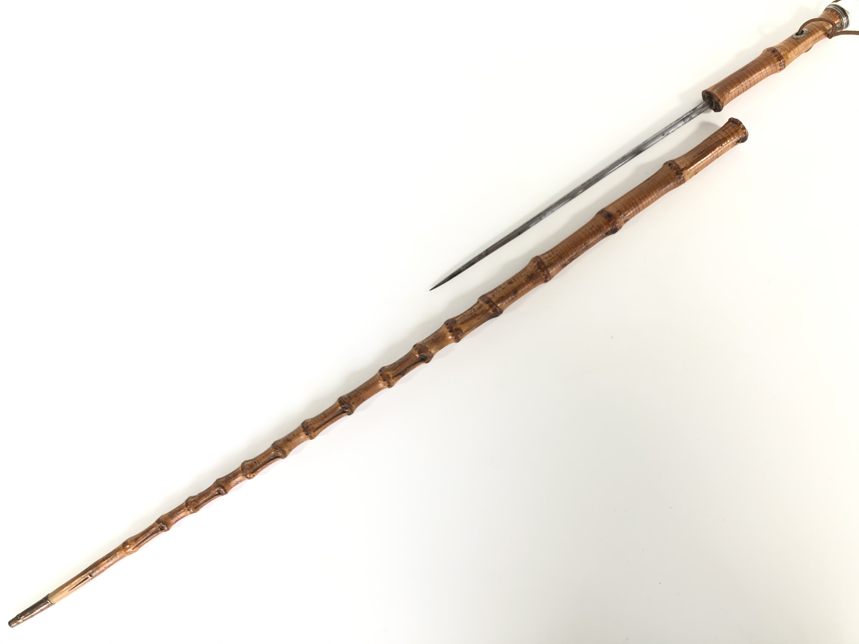 A Victorian white-metal mounted bamboo sward / dagger stick, having a ...