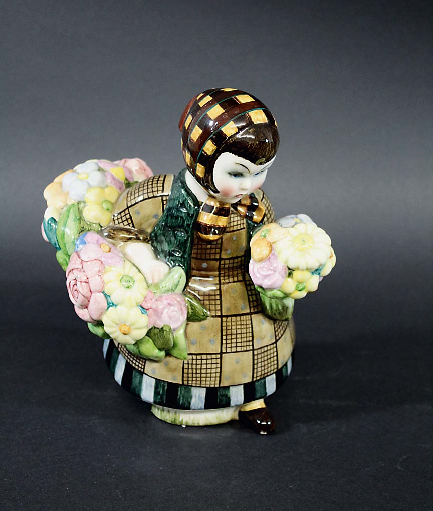 LENCI ITALIAN FIGURE a figure of a lady, holding a basket of flowers in ...