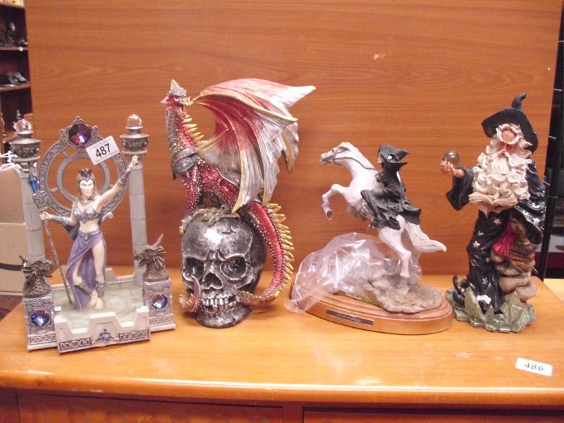 A collection of 4 fantasy figures including Discworld Clarecraft Death ...