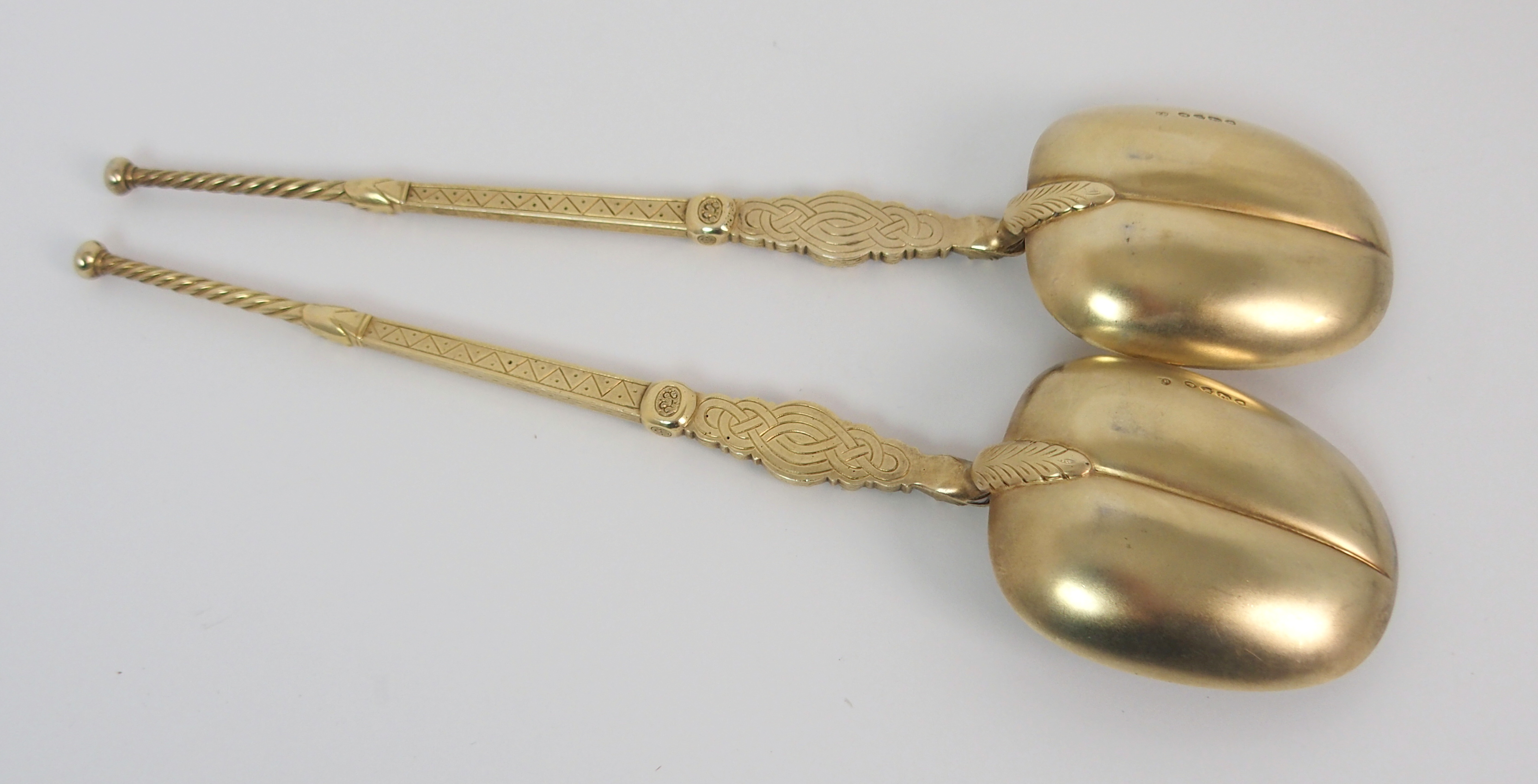 A cased pair of Victorian silver gilt replica coronation anointing ...