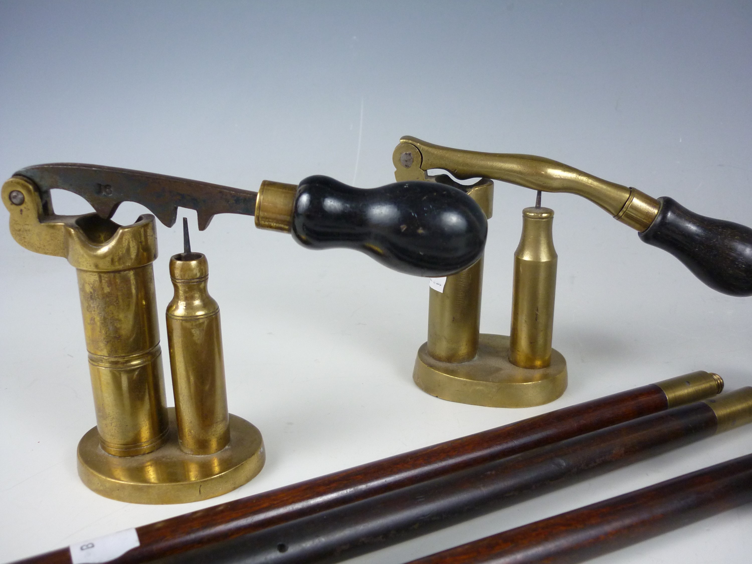 A group of late 19th Century gun tools including cartridge makers, a ...