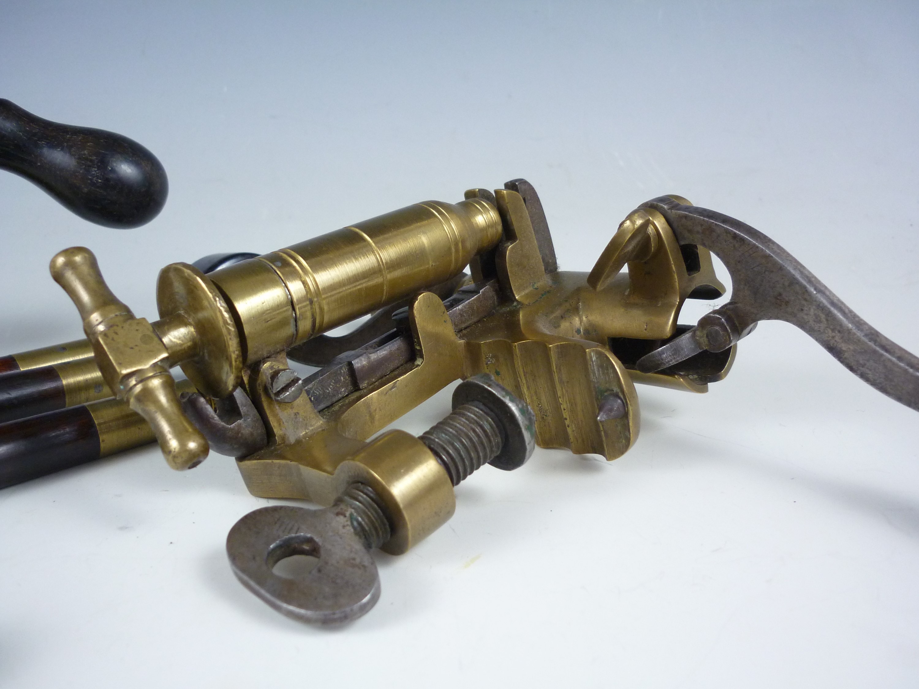 A group of late 19th Century gun tools including cartridge makers, a ...