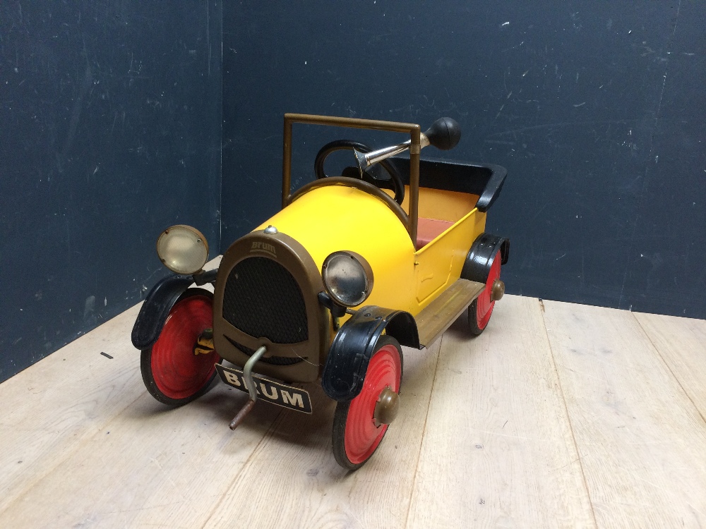 1 'Brum' toy pedal car (1 headlamp broken & horn not working)