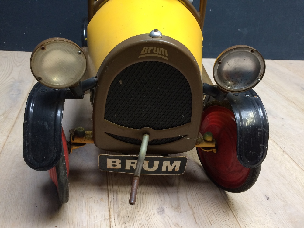 1 'Brum' toy pedal car (1 headlamp broken & horn not working)