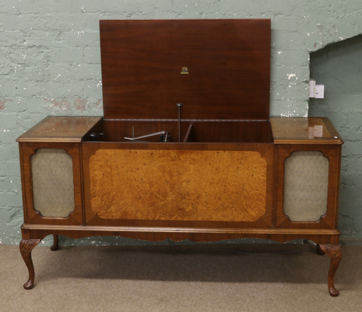 A Dynatron radiogram with Garrard turntable in walnut case, banded in ...